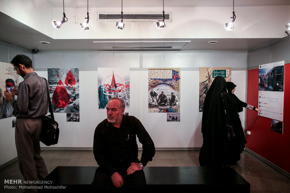 Posters highlight eight years of Iranian resistance against Iraqi invasion